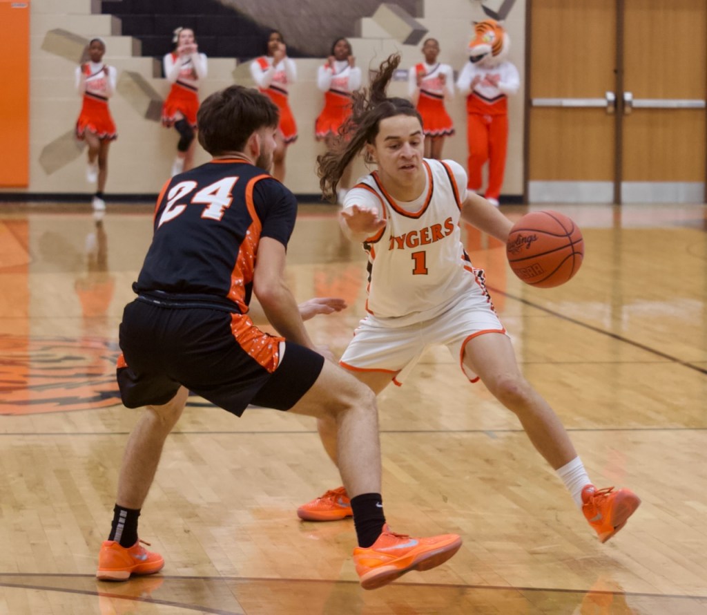 Ediger, Arrows tame Tygers in triple overtime