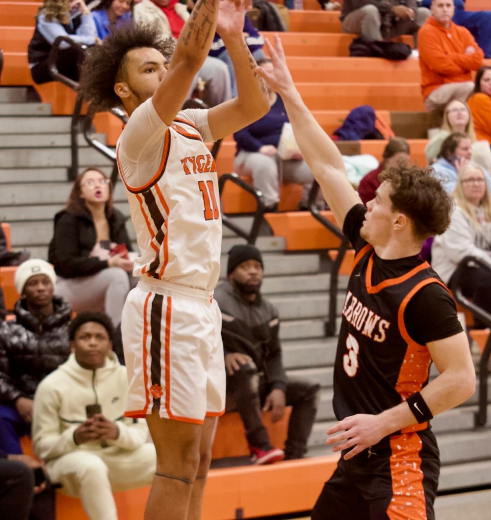 Ediger, Arrows tame Tygers in triple overtime thriller