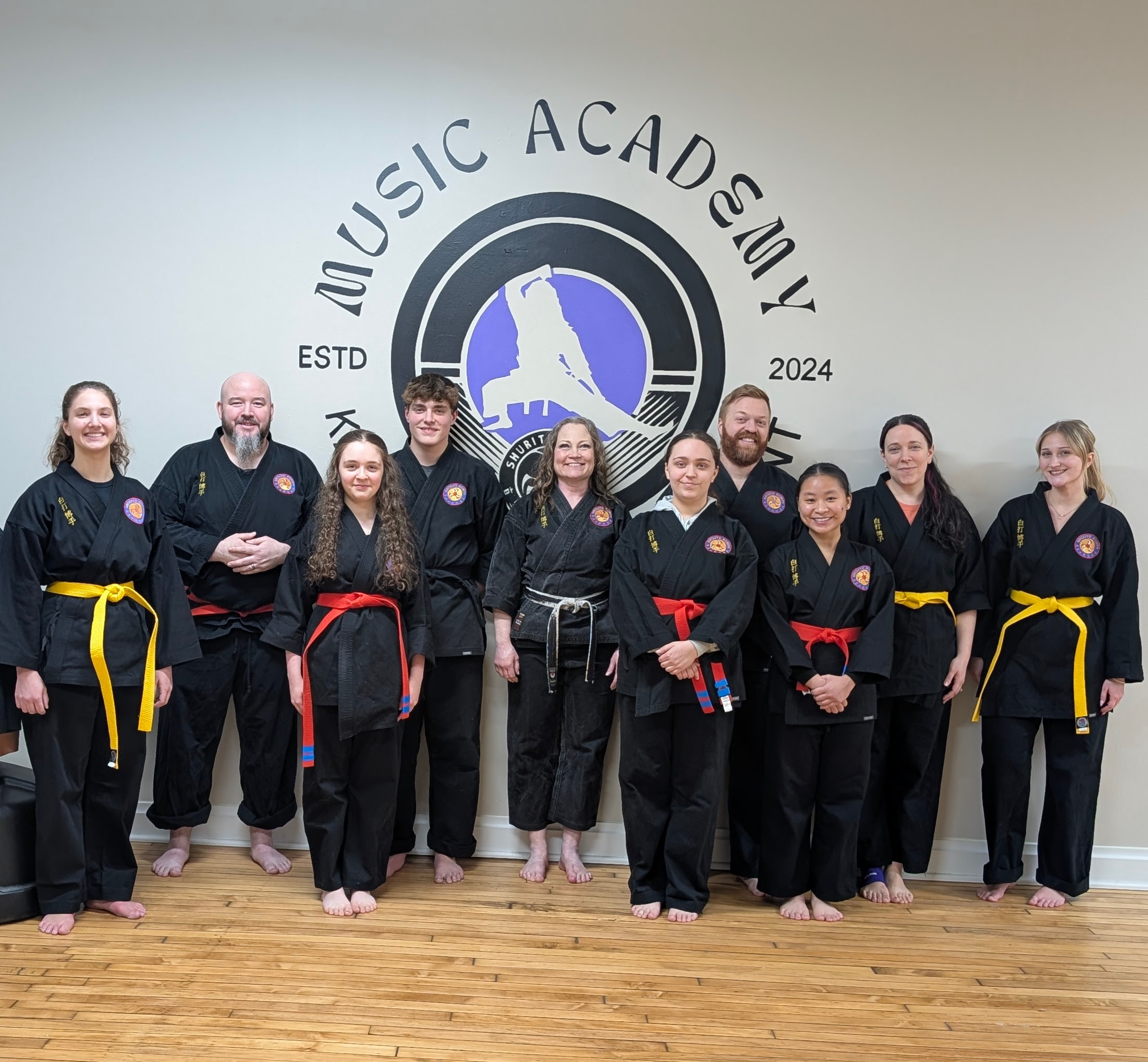 Adult karate class celebrates promotions at MAKE in downtown Mansfield